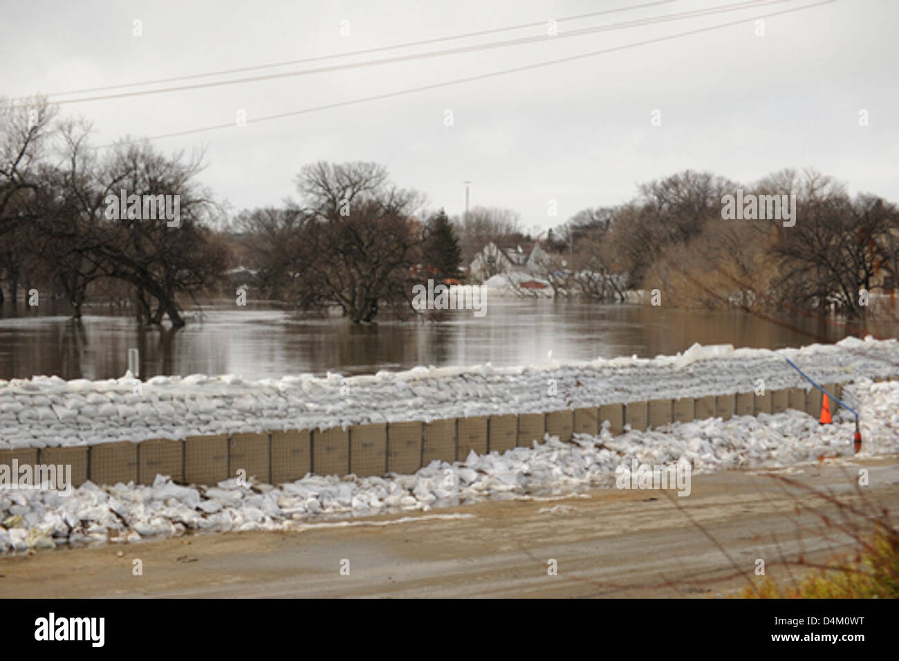 The Valley River experiences significant flooding, prompting a ...