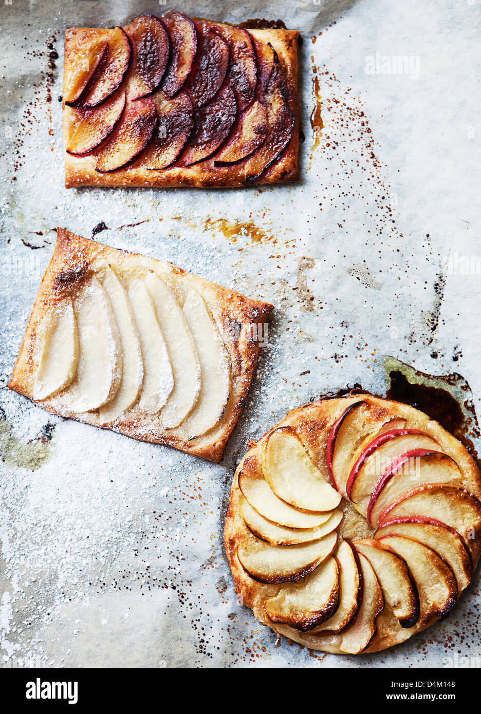 Baked fruit tarts in wax paper Stock Photo - Alamy