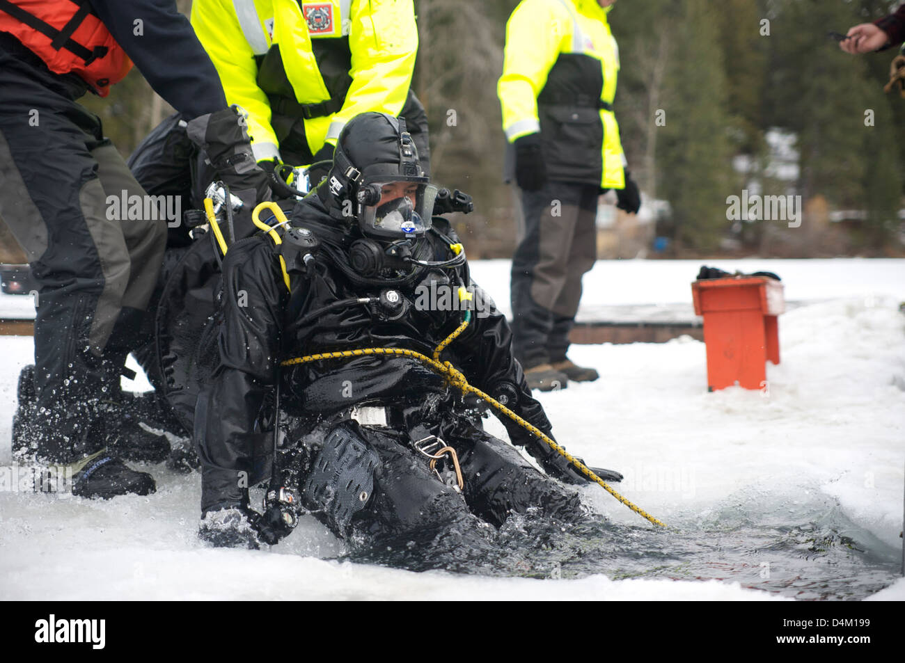 The Coast Guard conducts an ice diving course in Diamond Lake ...