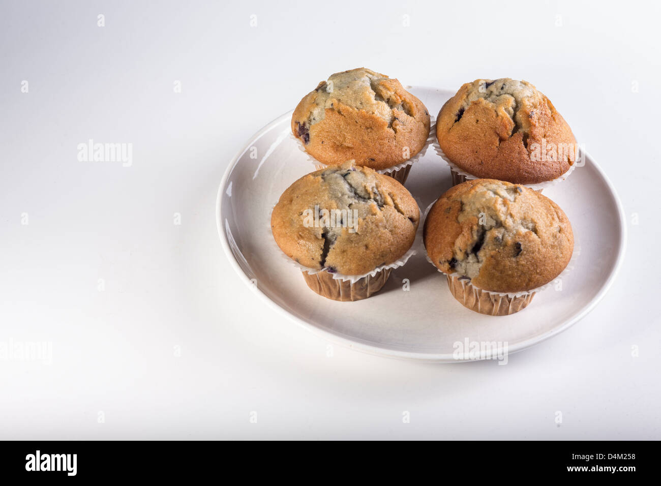 Plate of Blueberry Muffins Stock Photo - Alamy