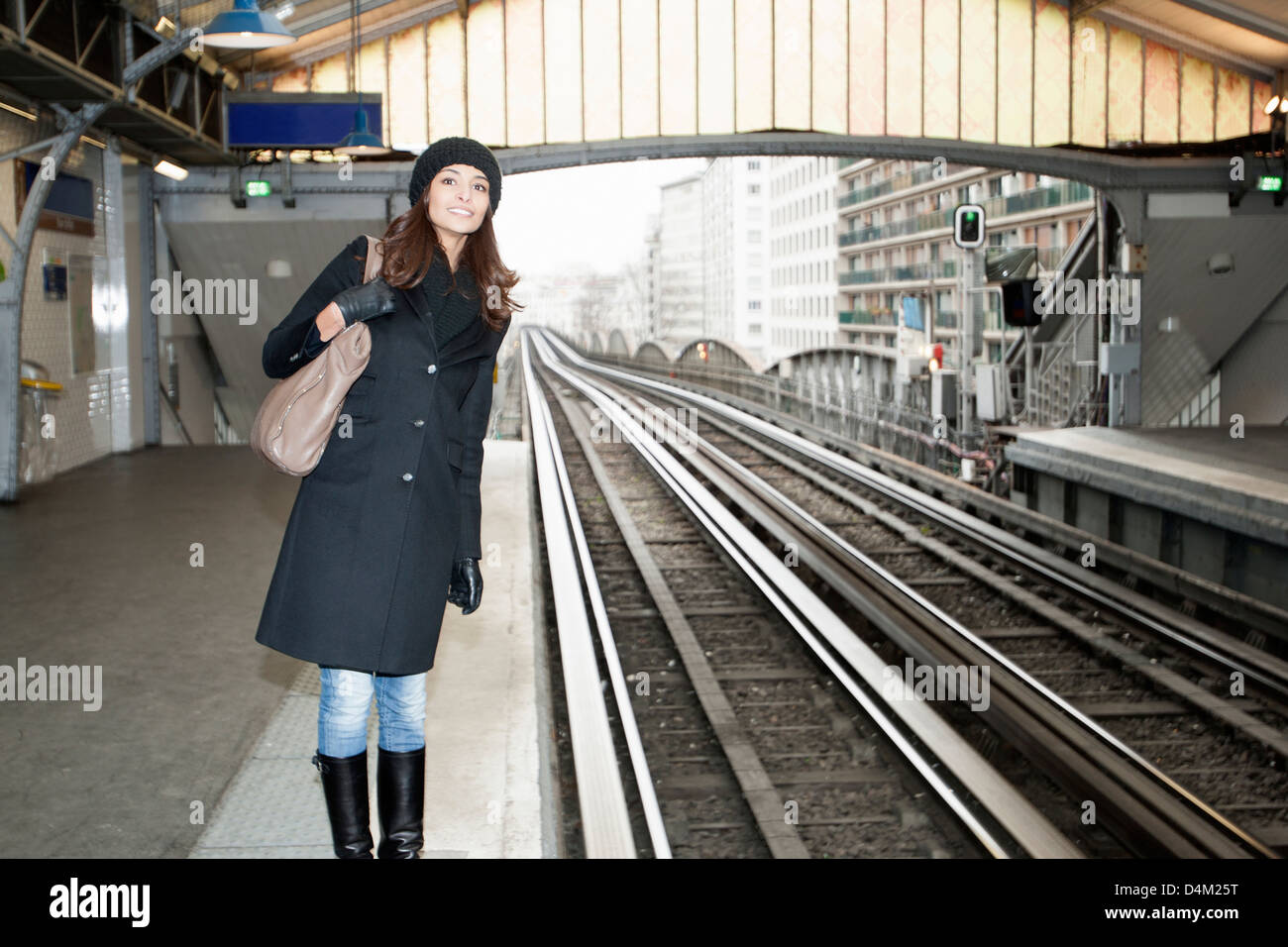 Woman waiting railway public hi-res stock photography and images - Alamy