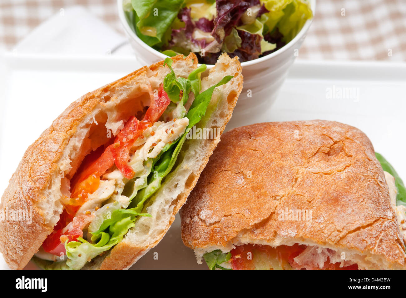 italian ciabatta panini sandwich with chicken and tomato Stock Photo ...