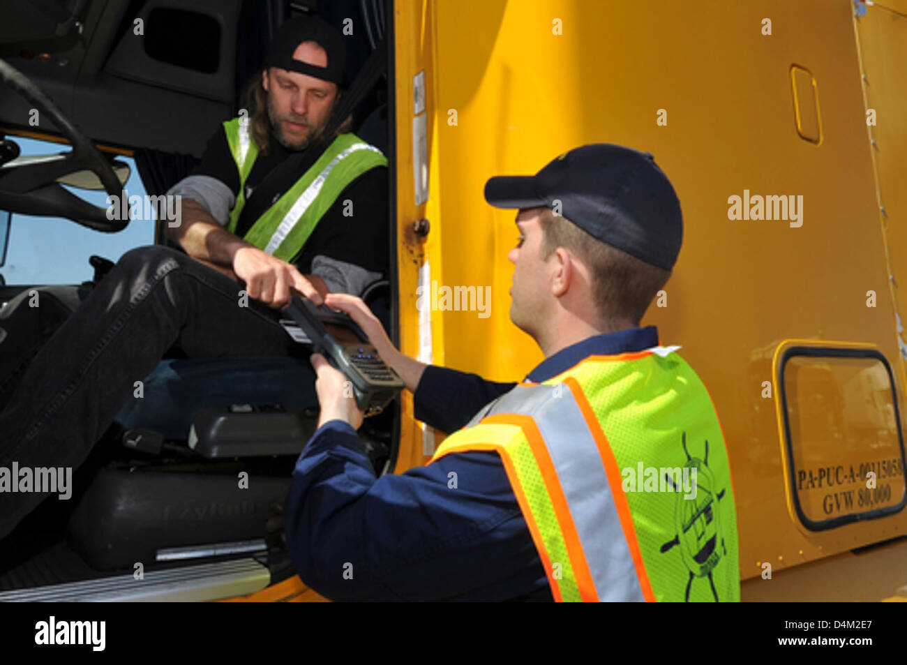 The Transportation Worker Identification Card (TWIC) scanner is used by ...