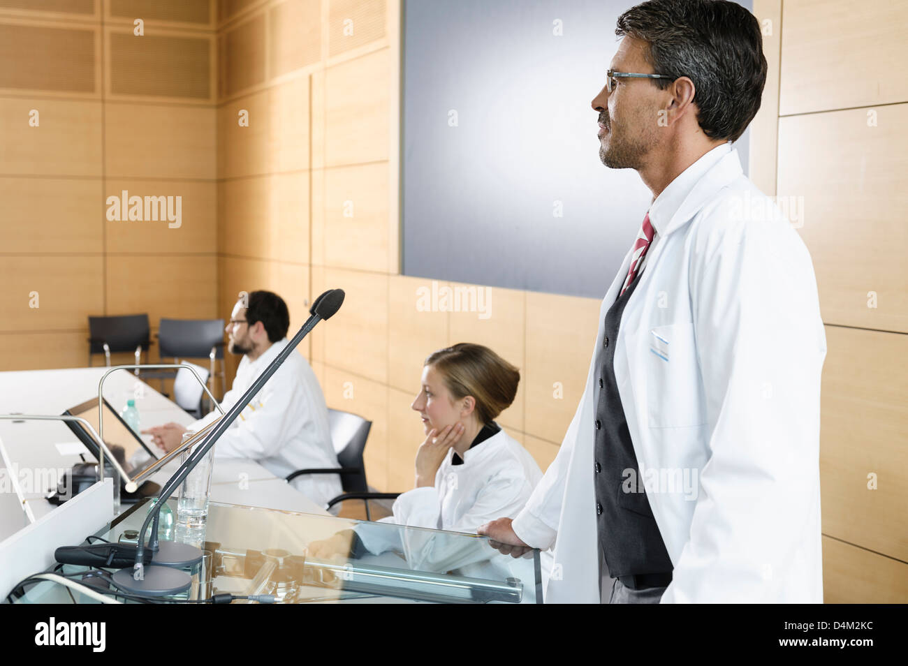 Female Giving Speech Podium High Resolution Stock Photography and ...