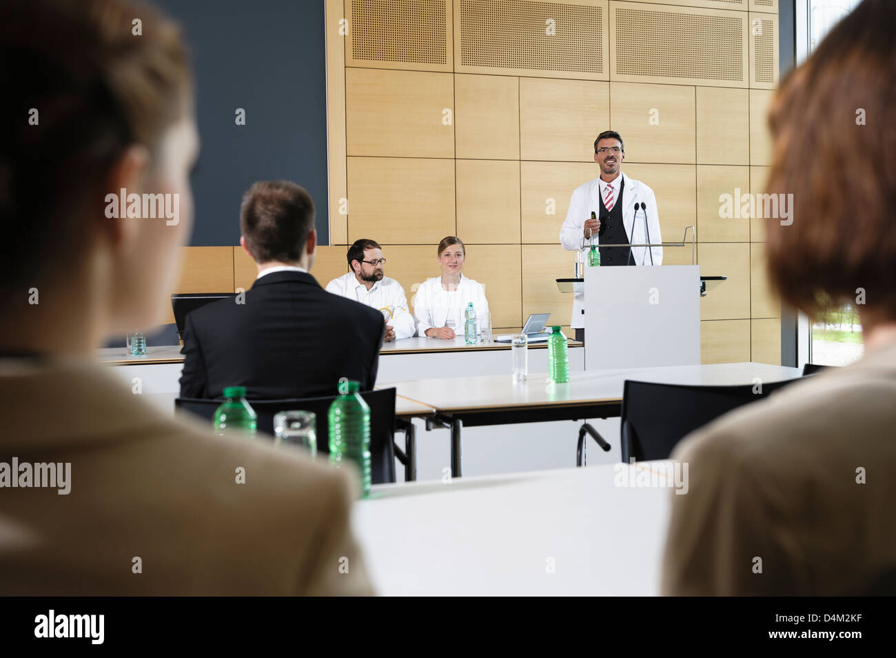 Doctor speaking at podium hi-res stock photography and images - Alamy