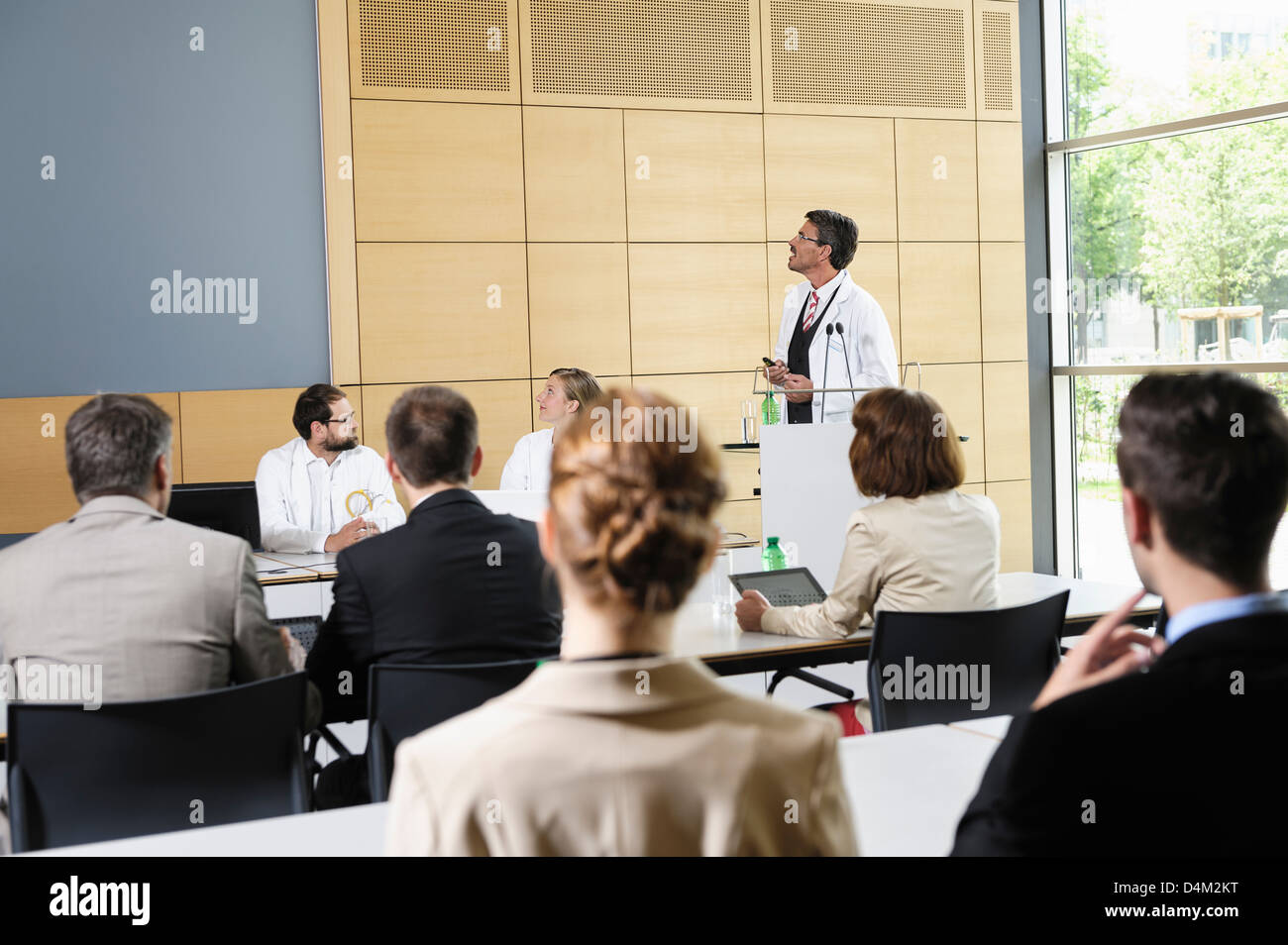 Doctor speaking at podium hi-res stock photography and images - Alamy