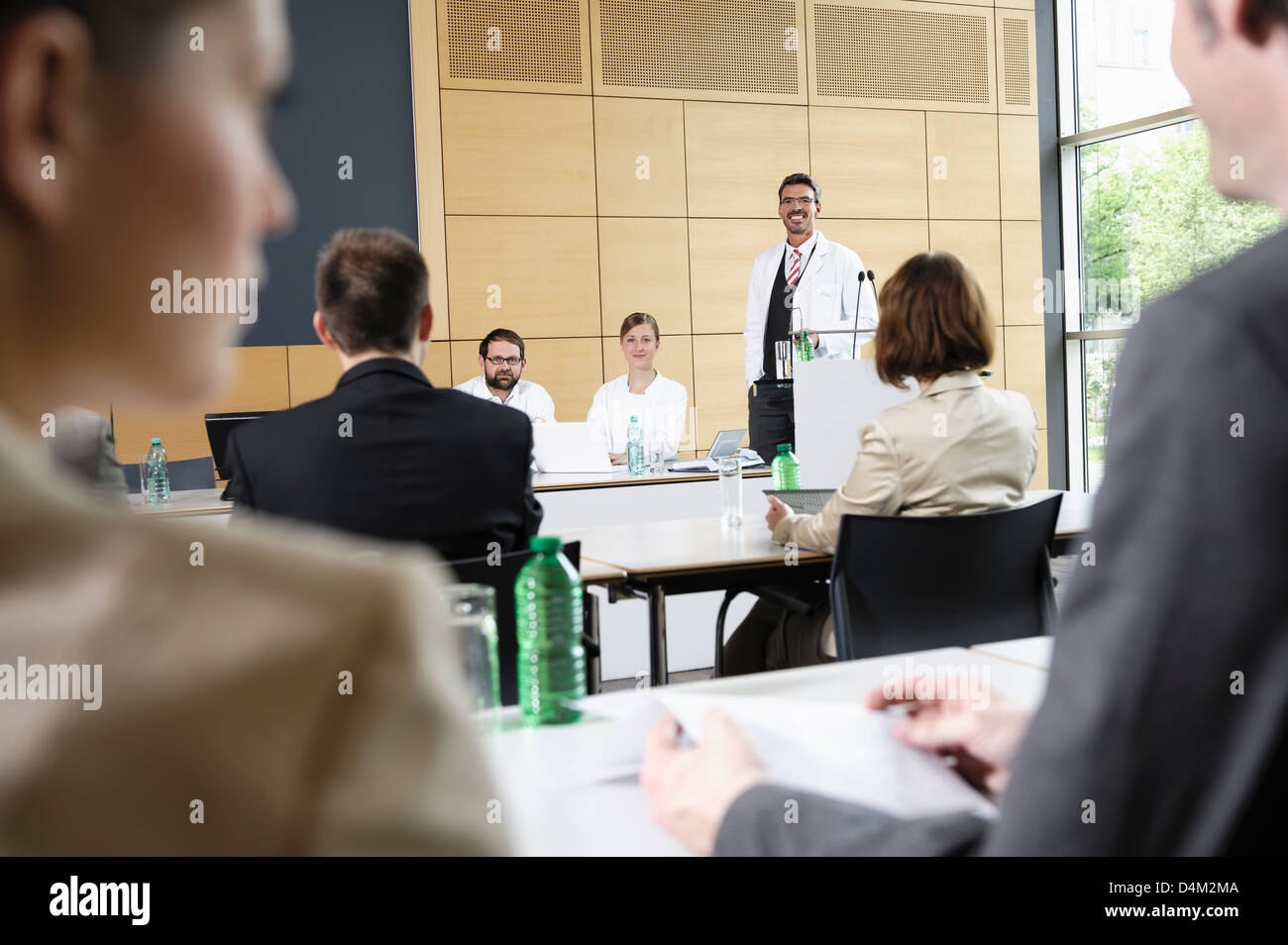 Doctor speaking podium hi-res stock photography and images - Alamy