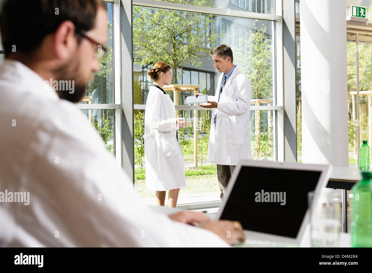 Doctors talking in conference room Stock Photo - Alamy