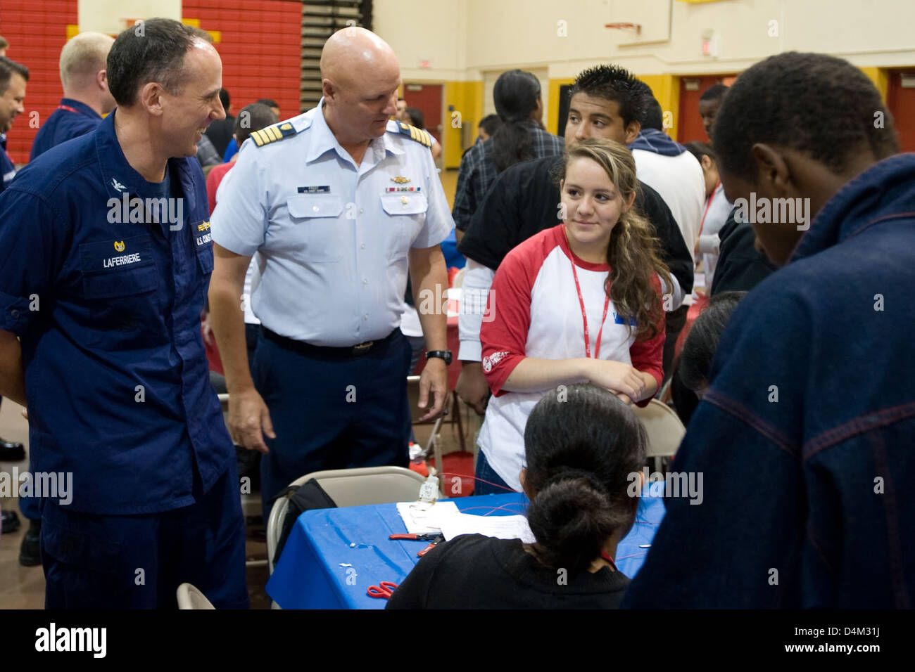 The image shows U.S. Coast Guard personnel participating in a ...