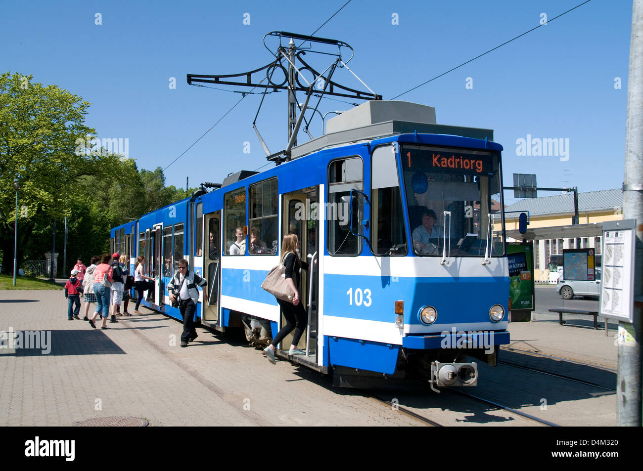 A city tram approaches a city tram stop in Tallinn, Estonia, Baltic ...