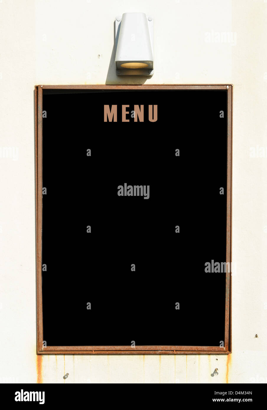 Empty menu board on wall Stock Photo - Alamy