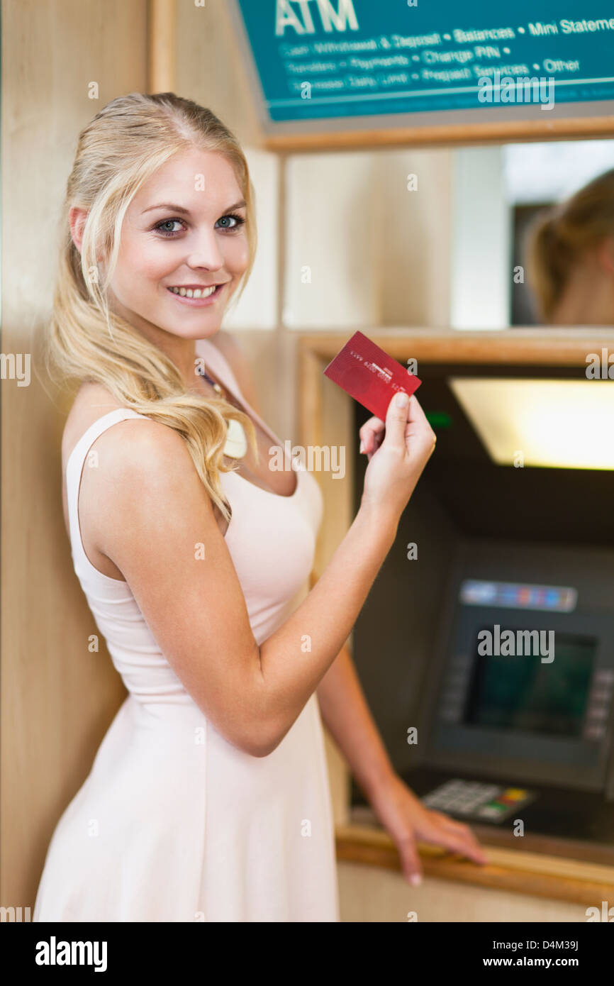 Woman bank inside teller hi-res stock photography and images - Alamy