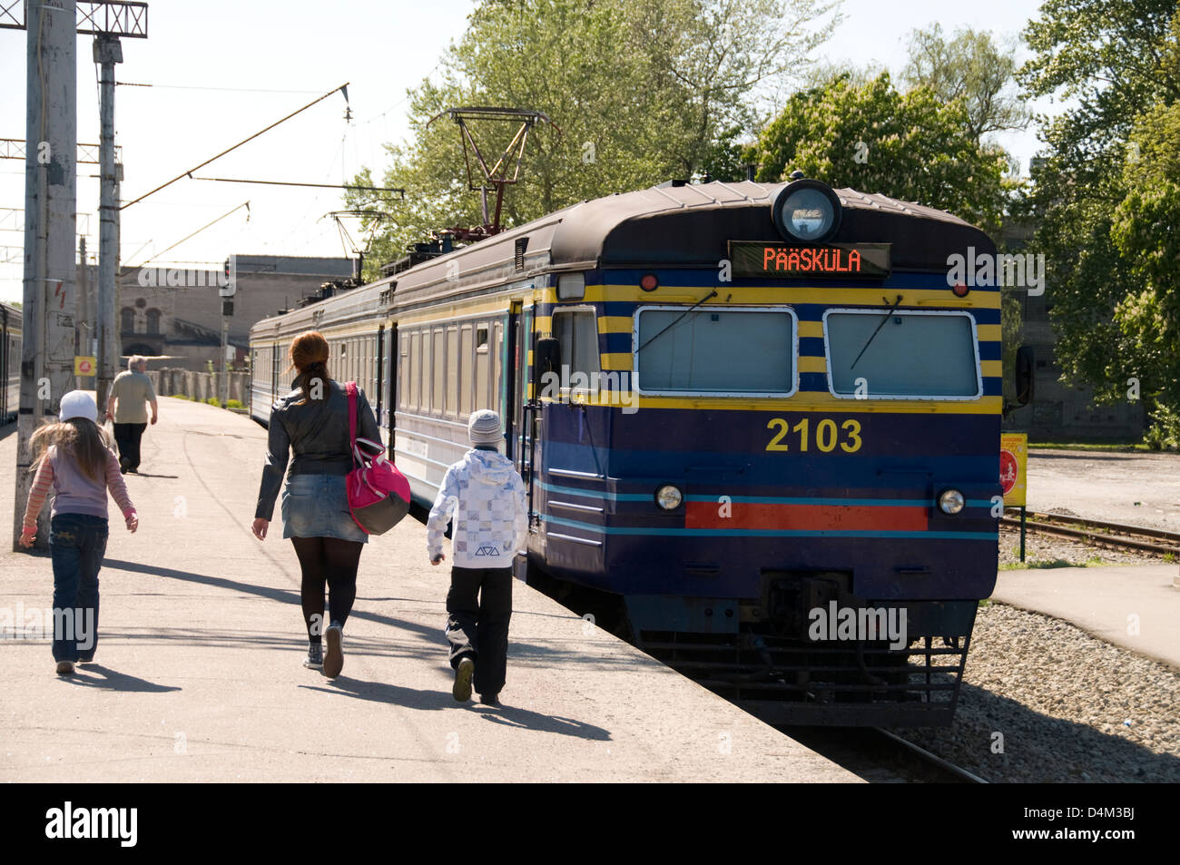 Passengers walk to their train at Tallinn mainline railway station in ...