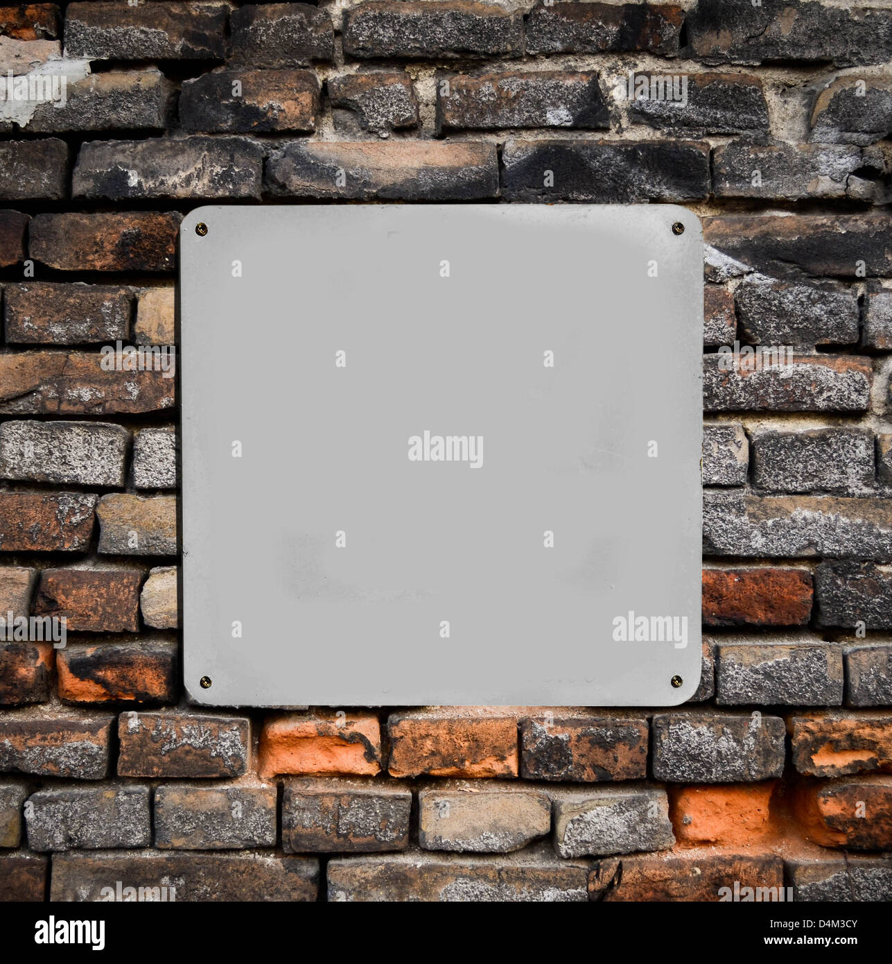 Empty metal sign on brick wall Stock Photo - Alamy