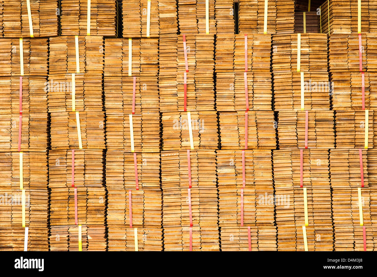 pile of wood in stock cut, painted, and marked Stock Photo - Alamy
