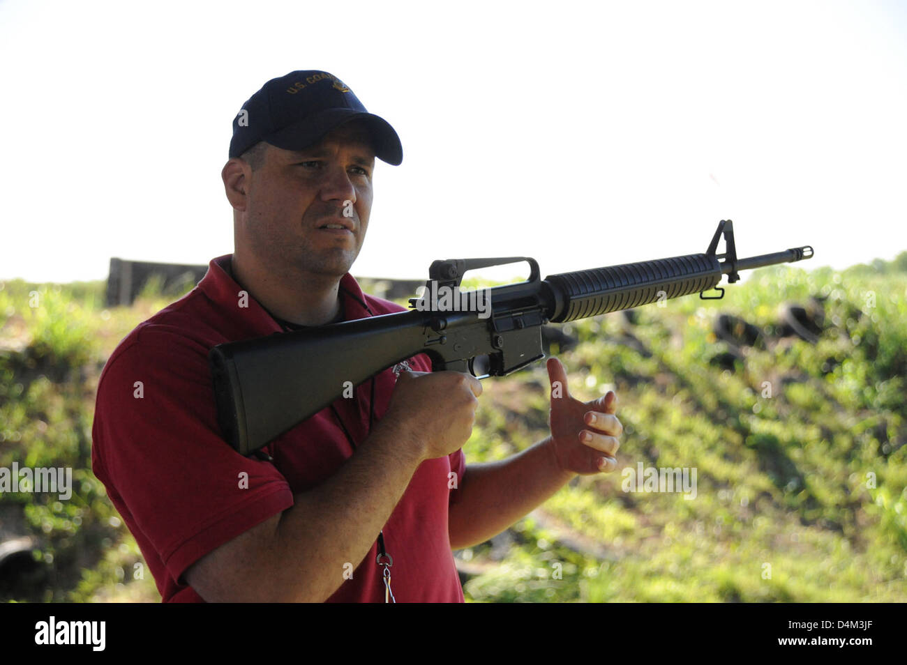 Coast Guard personnel undergo small arms and rifle training at the ...