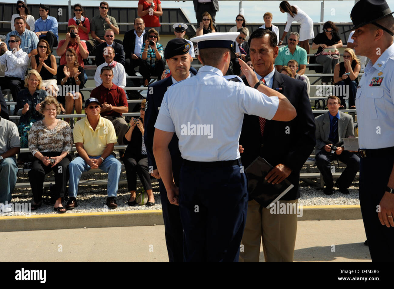 Seaman Recruit Richard Gabor salutes during his graduation ceremony at ...