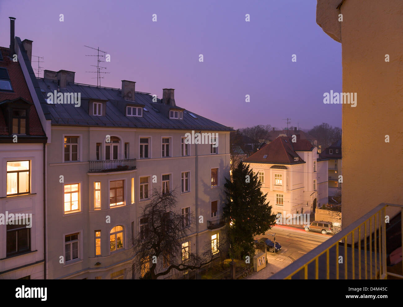 Apartment buildings lit up at night Stock Photo - Alamy