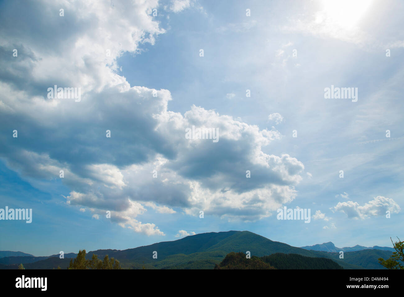Clouds over rural landscape Stock Photo - Alamy