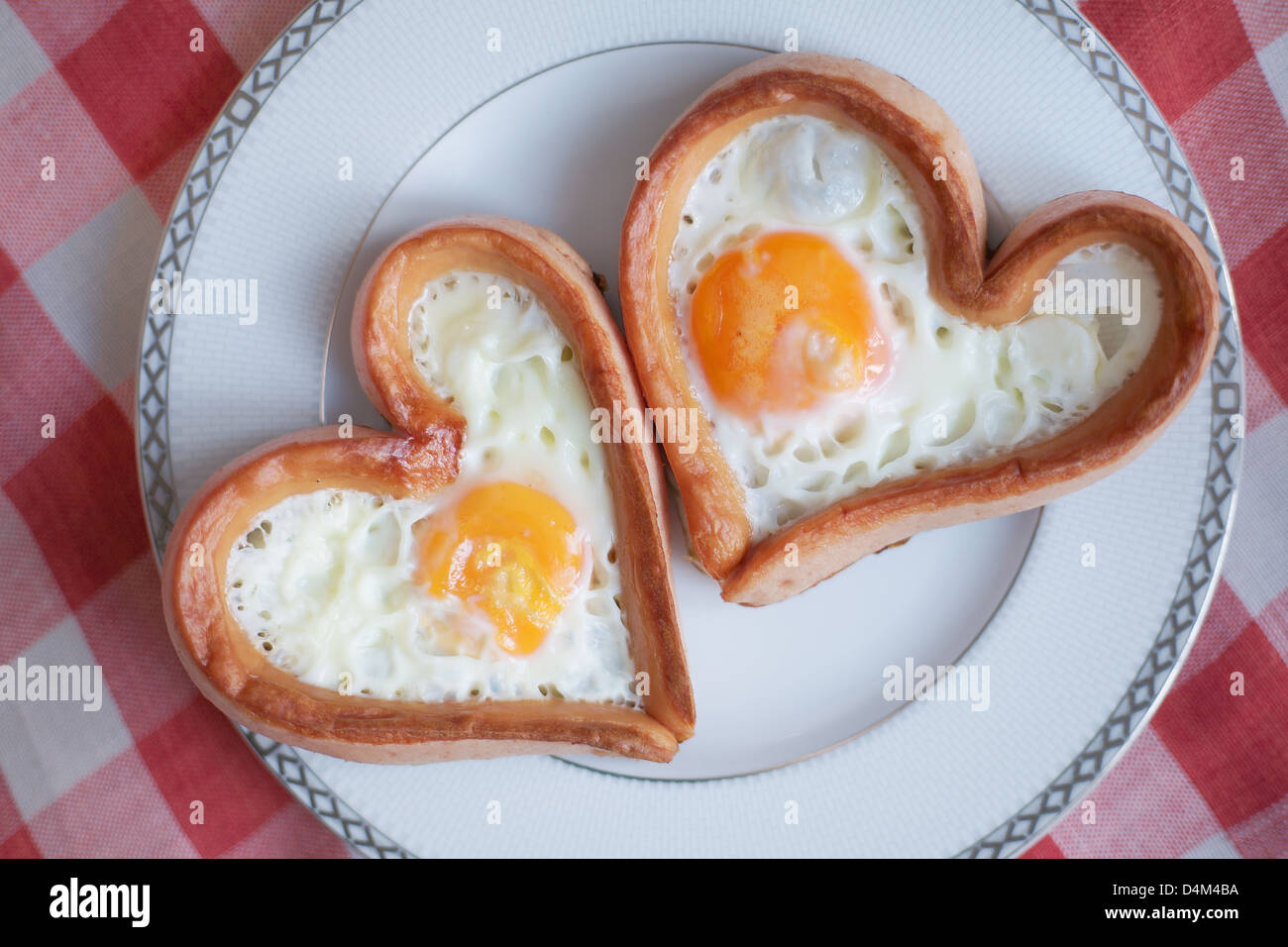 Breakfast in the shape of a heart Stock Photo - Alamy