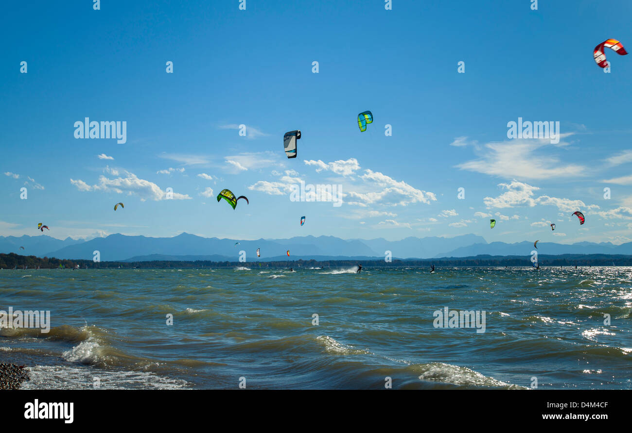 Sails of kitesurfers over choppy waves Stock Photo - Alamy