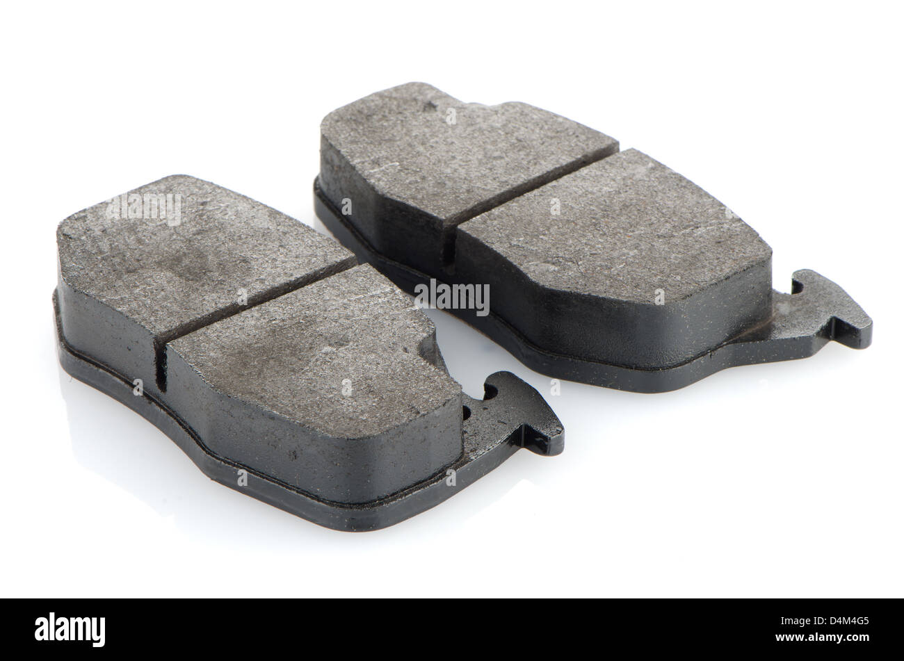 Car brake pads on white reflective background Stock Photo - Alamy