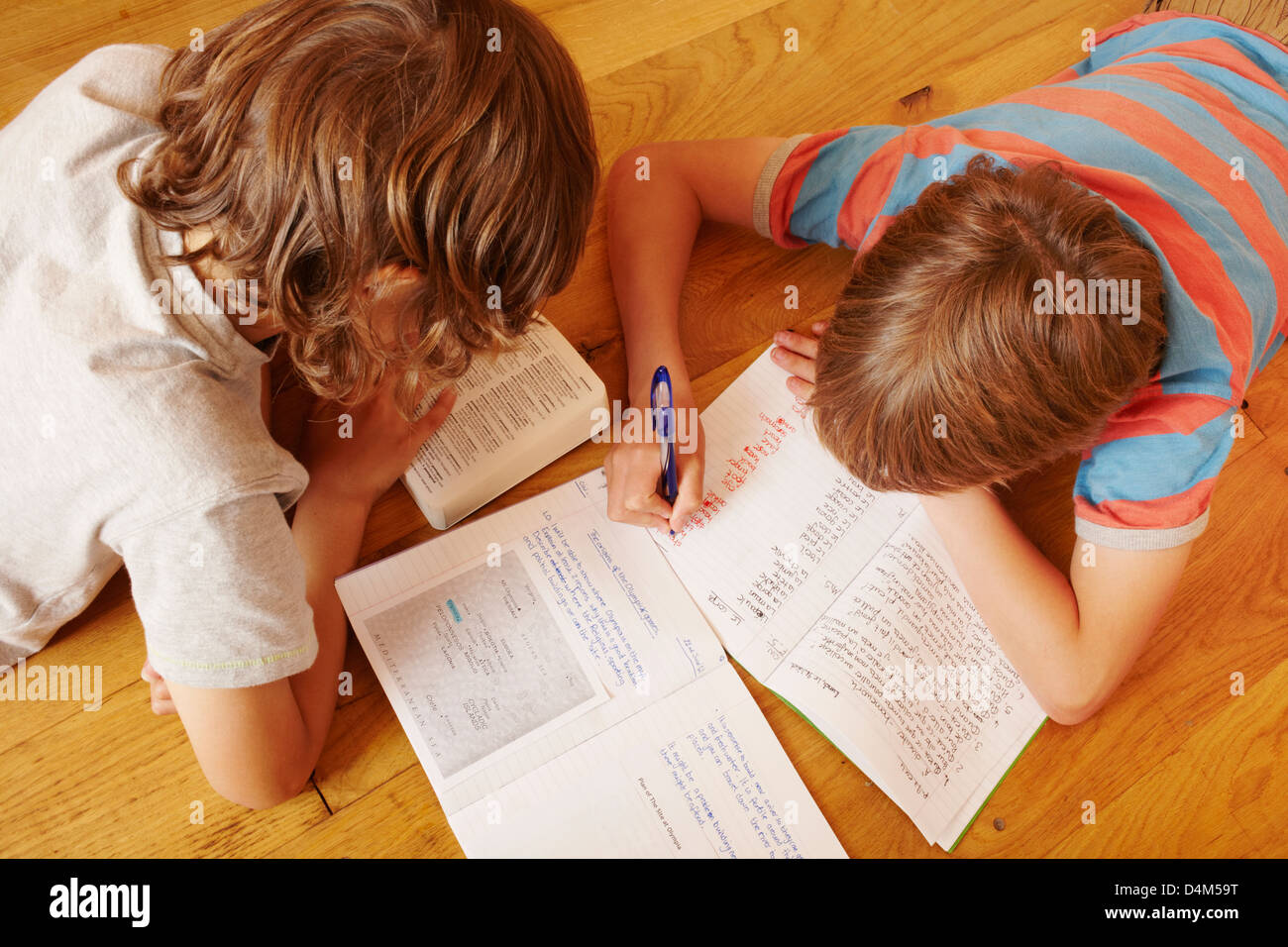 Boys schoolwork together hi-res stock photography and images - Alamy