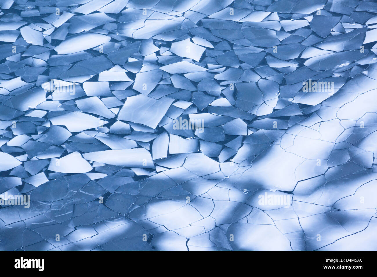 Aerial view of a frozen Red Tarn below Helvellyn in the Lake District ...