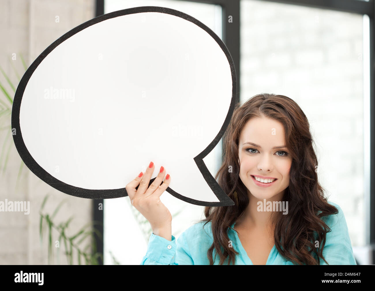 smiling young woman with blank text bubble Stock Photo - Alamy