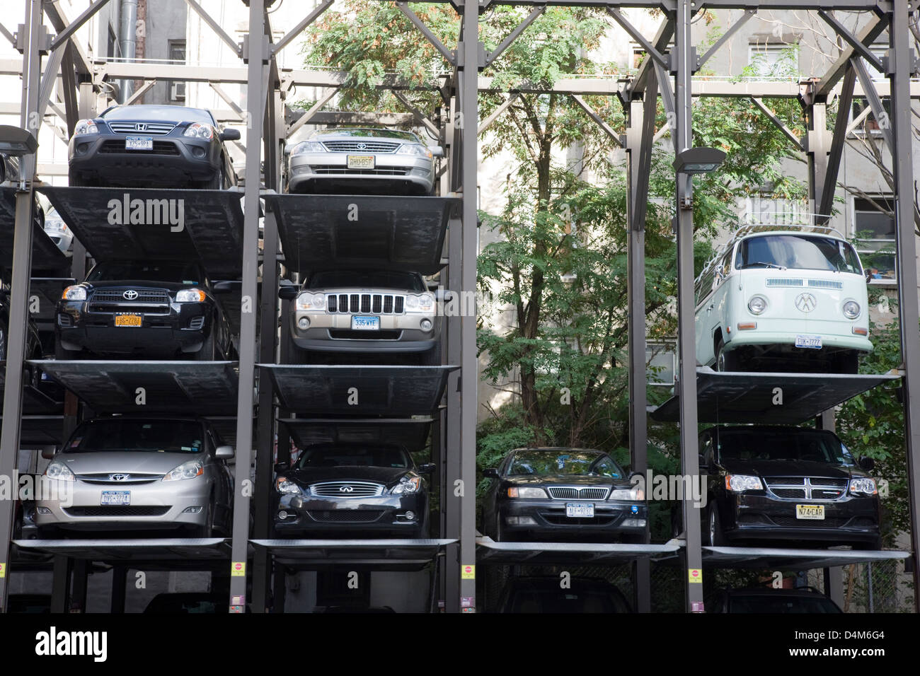 Stacked parking racking car park in Chinatown, New York Stock Photo - Alamy