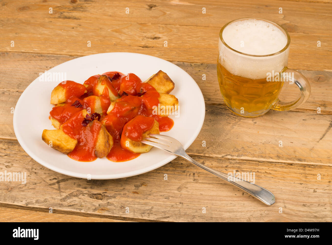 Spanish tapa served on a rustic bar counter Stock Photo - Alamy