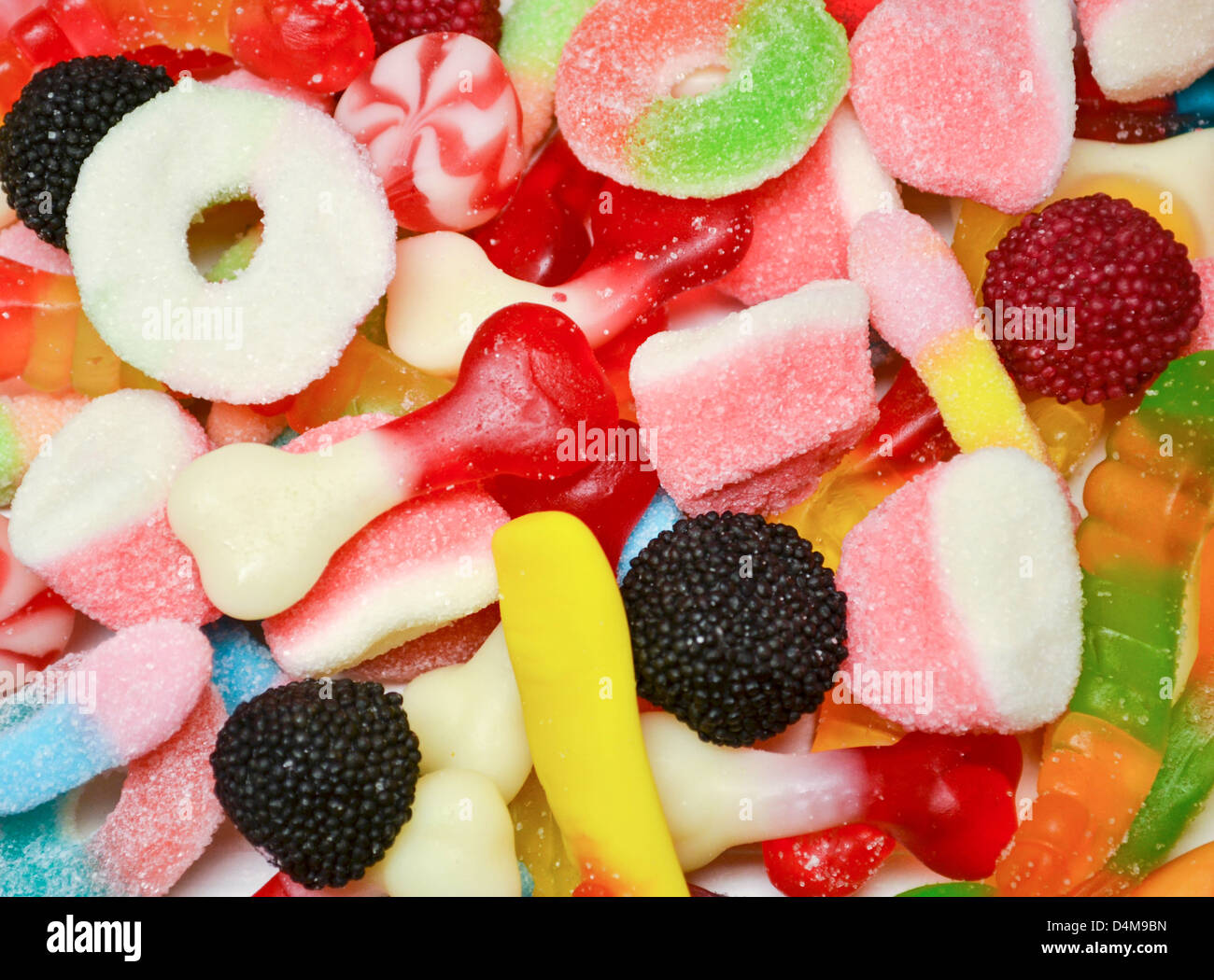 Mixed colorful candies background Stock Photo - Alamy