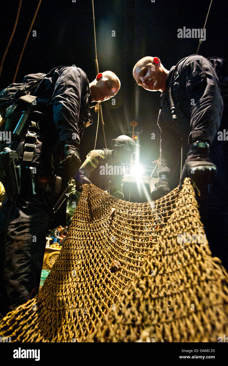 The U.S. Coast Guard Cutter Forward engages in an international ...