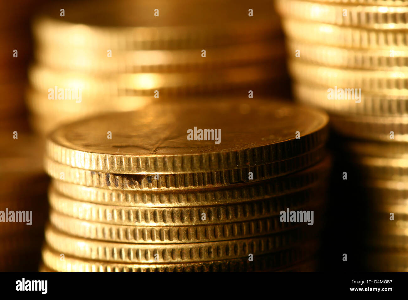 golden piles of coins macro background Stock Photo - Alamy