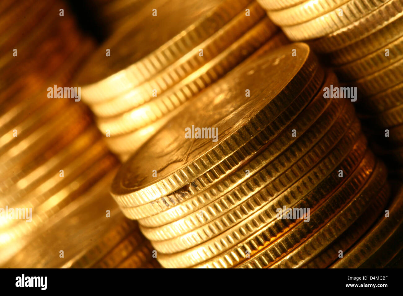 golden piles of coins macro background Stock Photo - Alamy