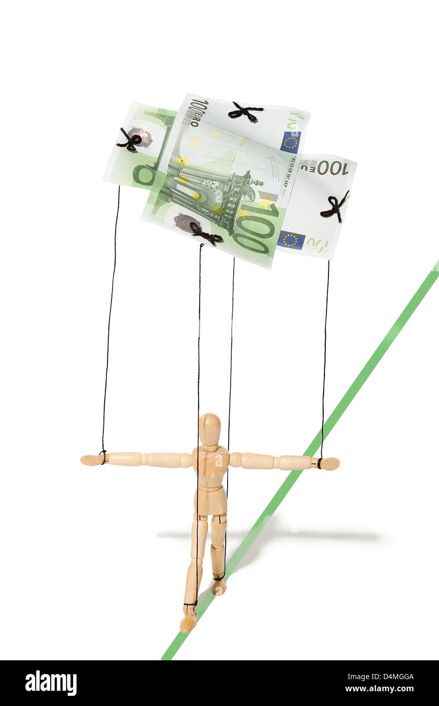 concept, a puppet controlled by money Stock Photo - Alamy