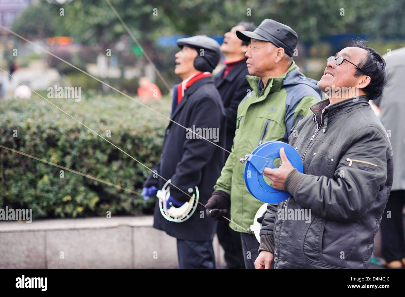 Local men flying kites in Wushan Square, Hangzhou, China Stock Photo ...