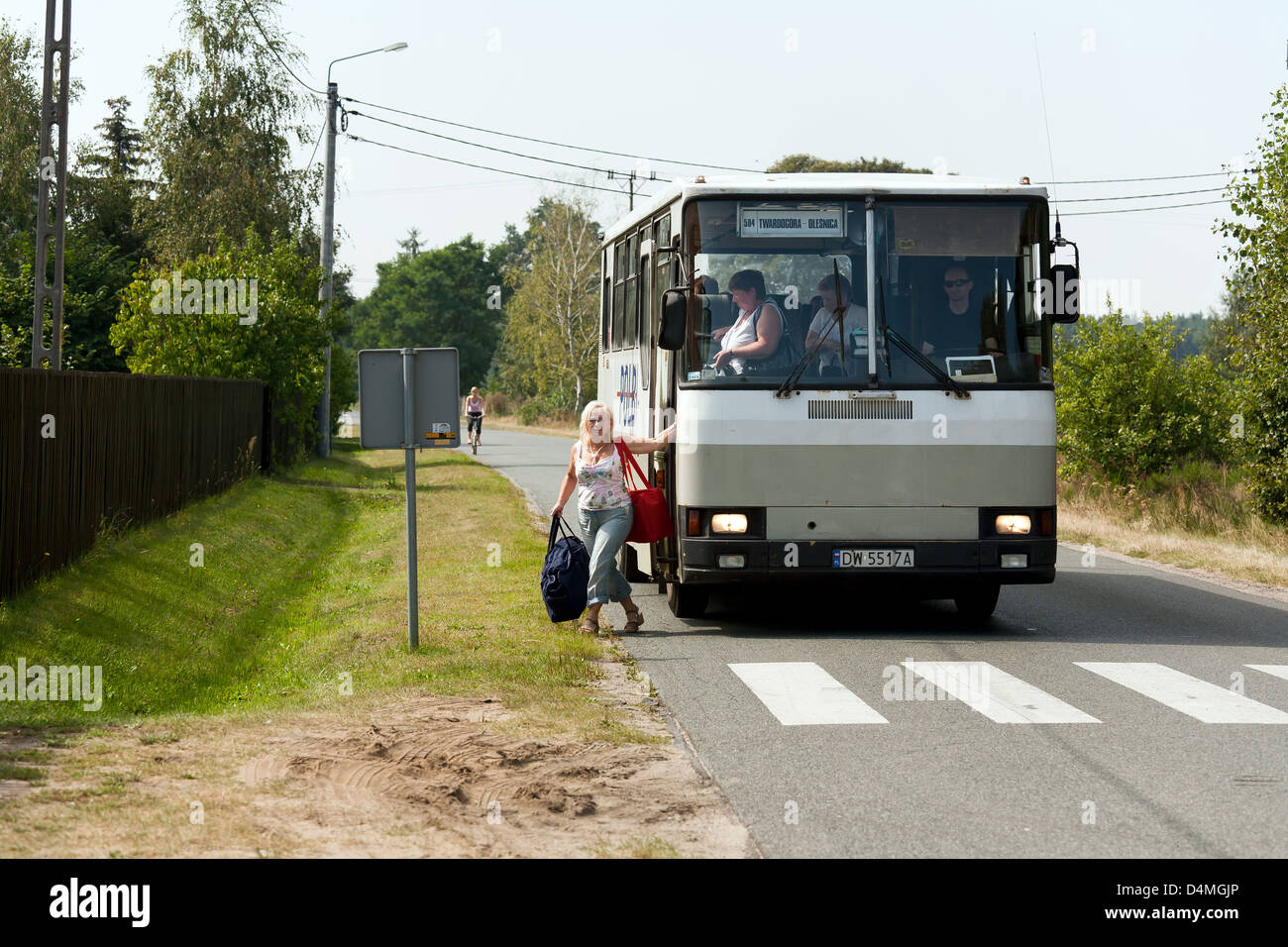 Miodary, Poland Passengers alight from a overland bus Stock Photo - Alamy