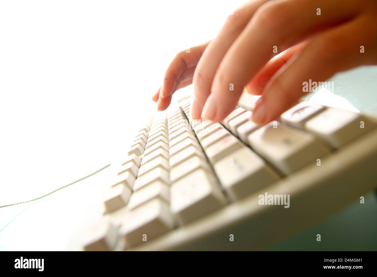 girl hands typing on keyboard macro close up Stock Photo - Alamy