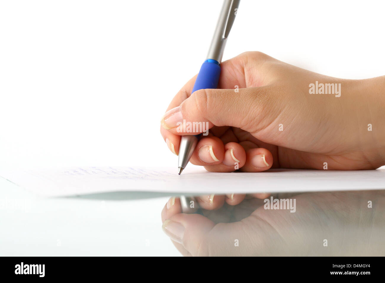 girl write on white paper close up Stock Photo - Alamy