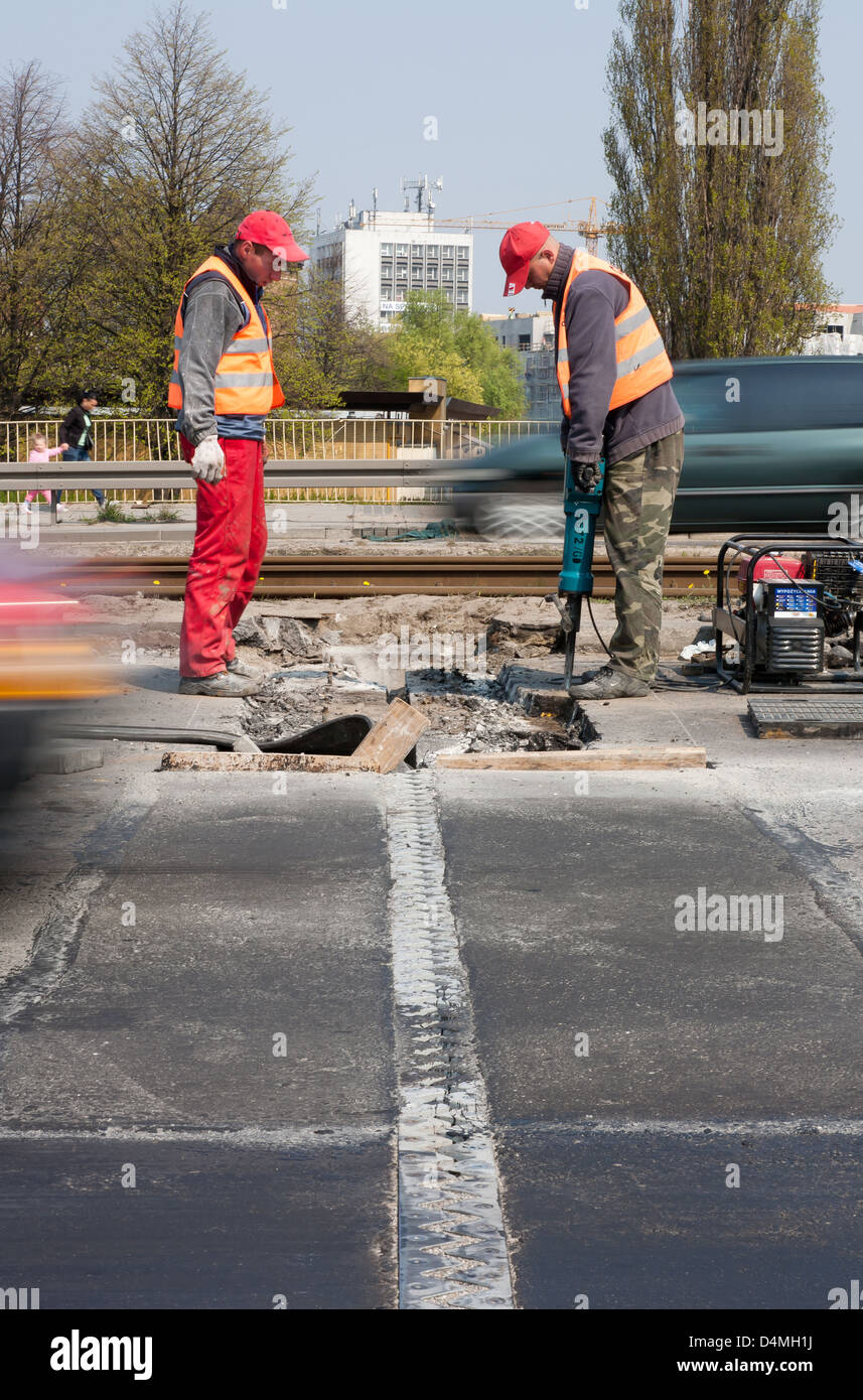 Construction workers road works poland hi-res stock photography and ...