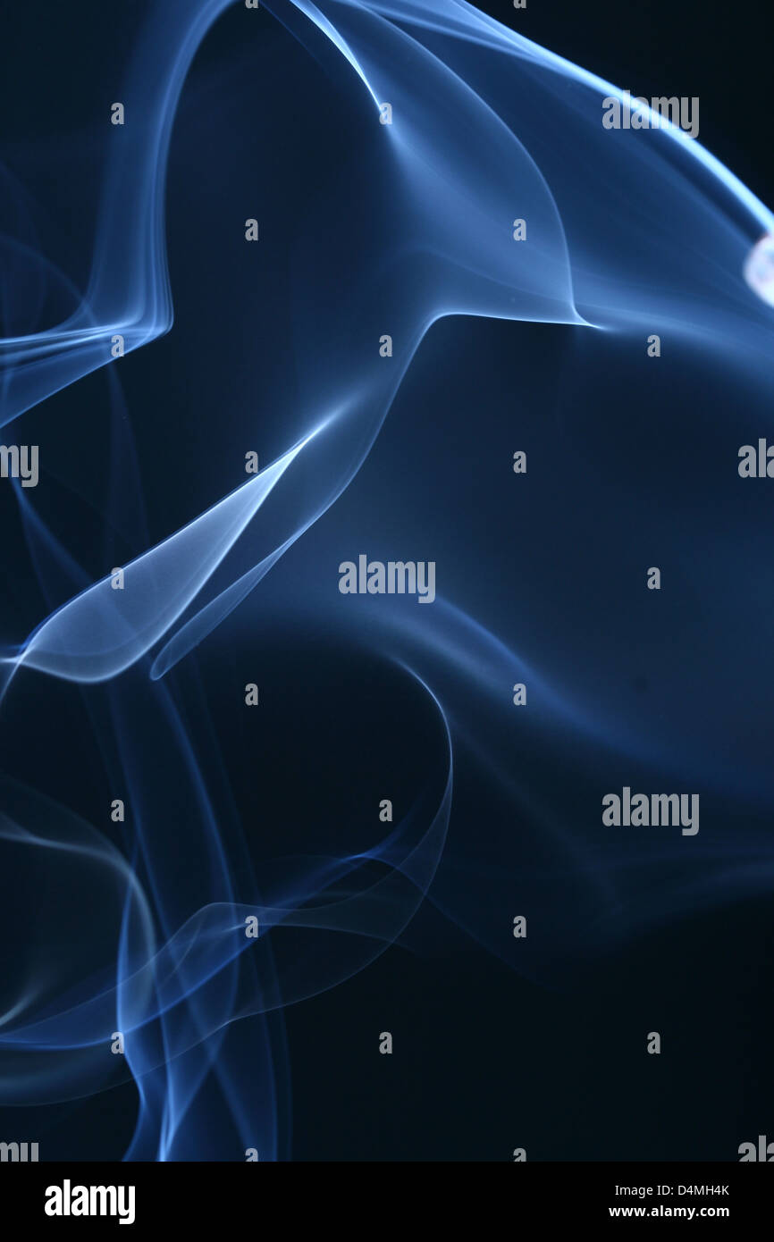 blue smoke on black background Stock Photo - Alamy
