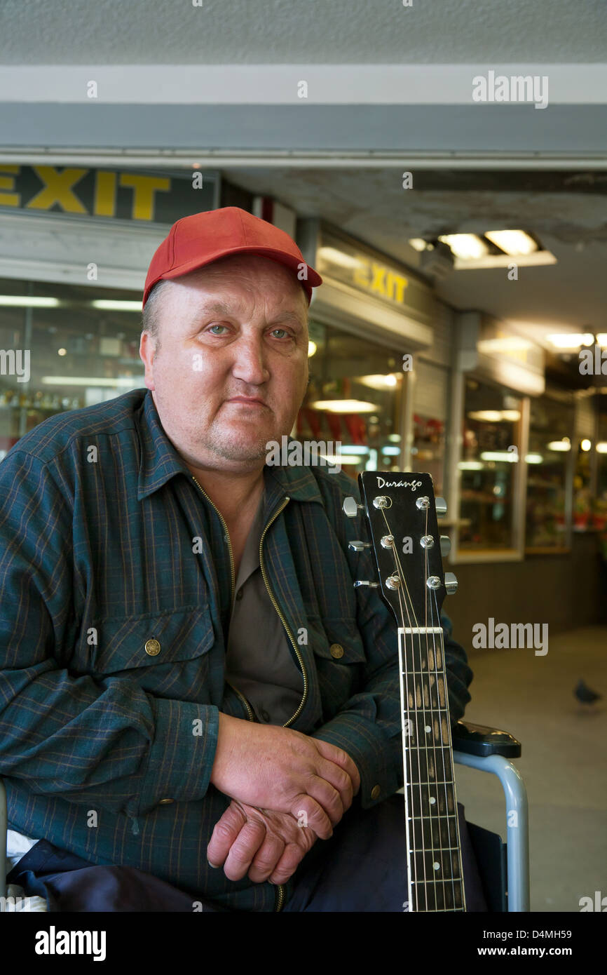 Gdansk, Poland, homeless disabled plays guitar in a underpass Stock ...