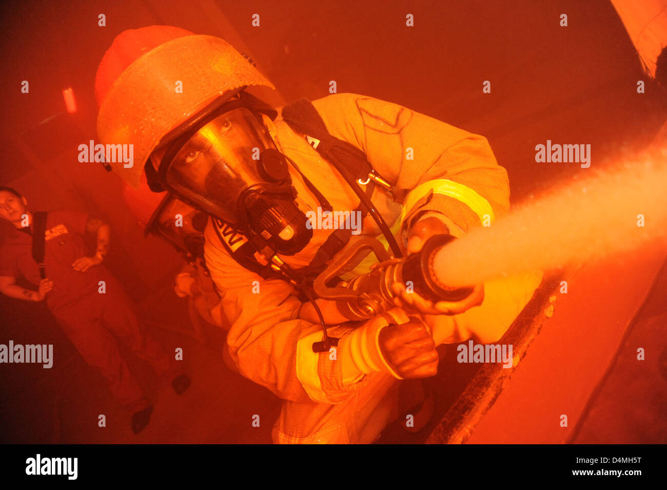 A fire training exercise for the U.S. Coast Guard where personnel ...