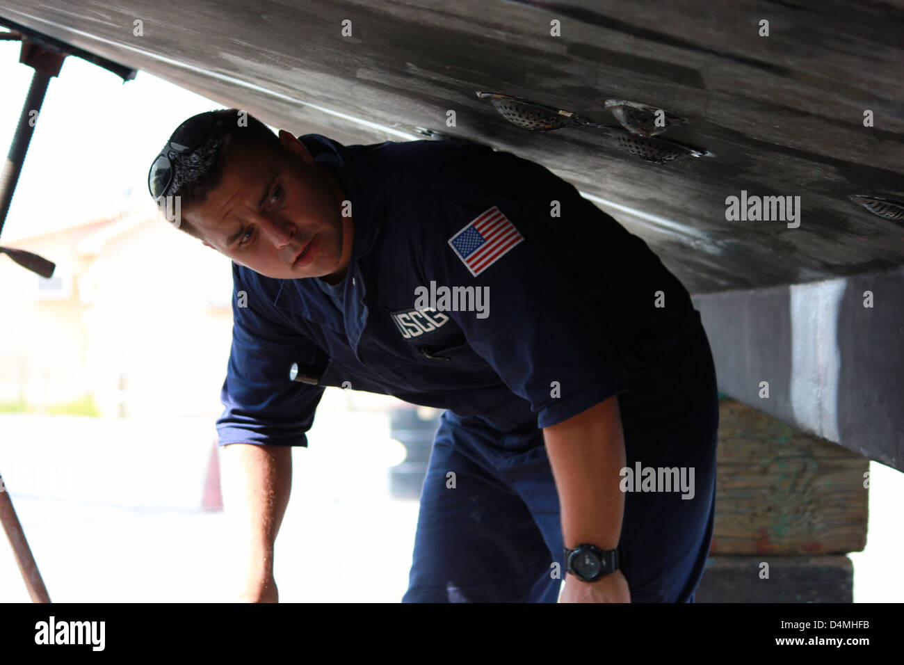 The U.S. Coast Guard conducts a dry dock inspection of one of its ...