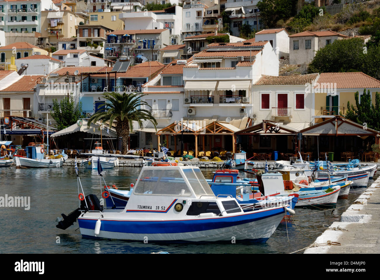 Samos. Greece. Colourful fishing boats docked in the pretty harbour of ...