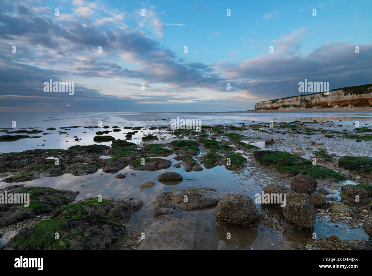 Low tide at Hunstanton on the North Norfolk Coast with it's distinctive ...
