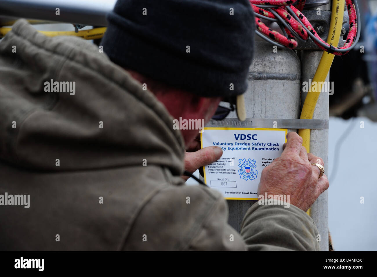 The U.S. Coast Guard in Alaska conducts safety inspections on vessels ...
