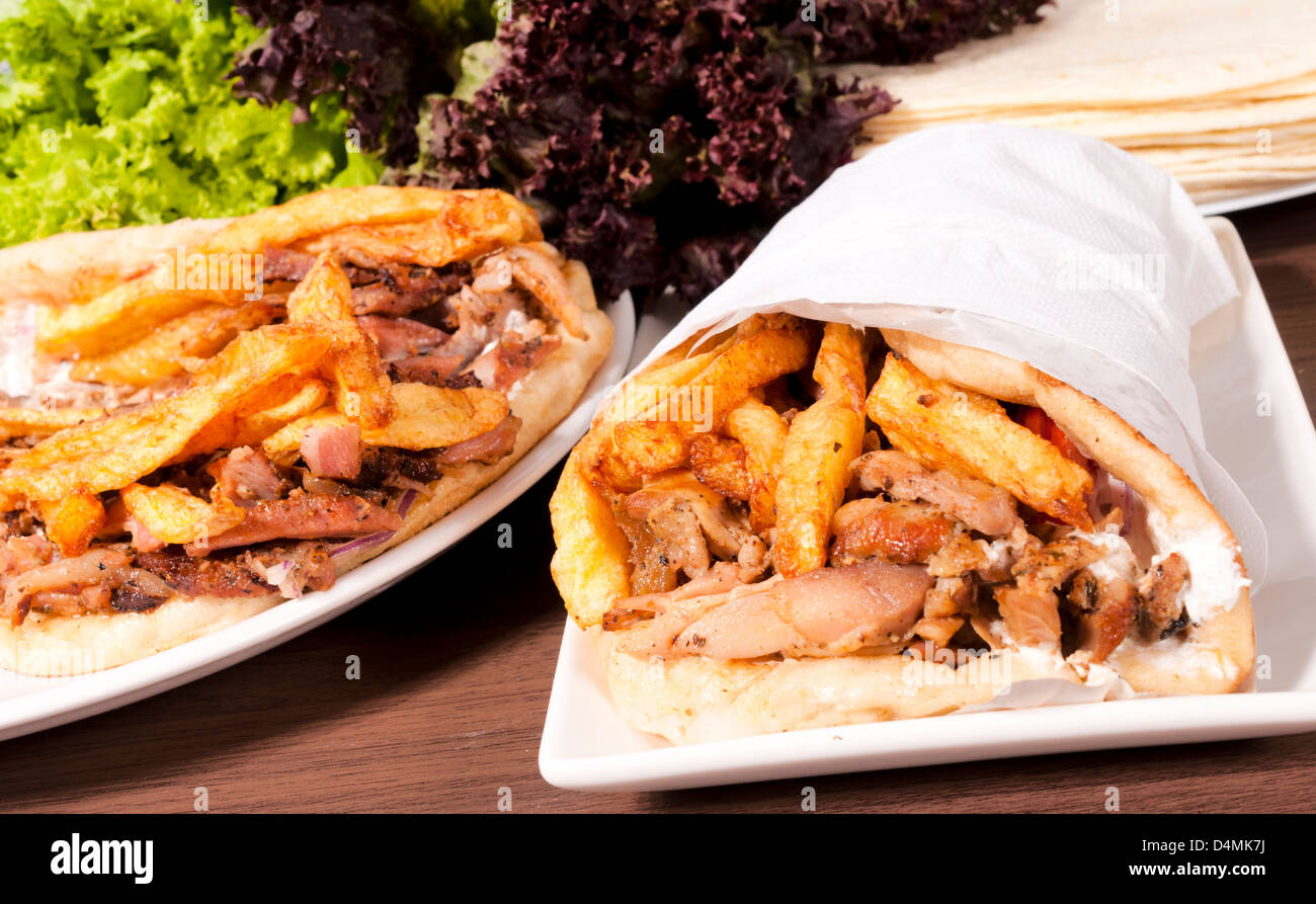 Doner kebabs on the plates Stock Photo - Alamy