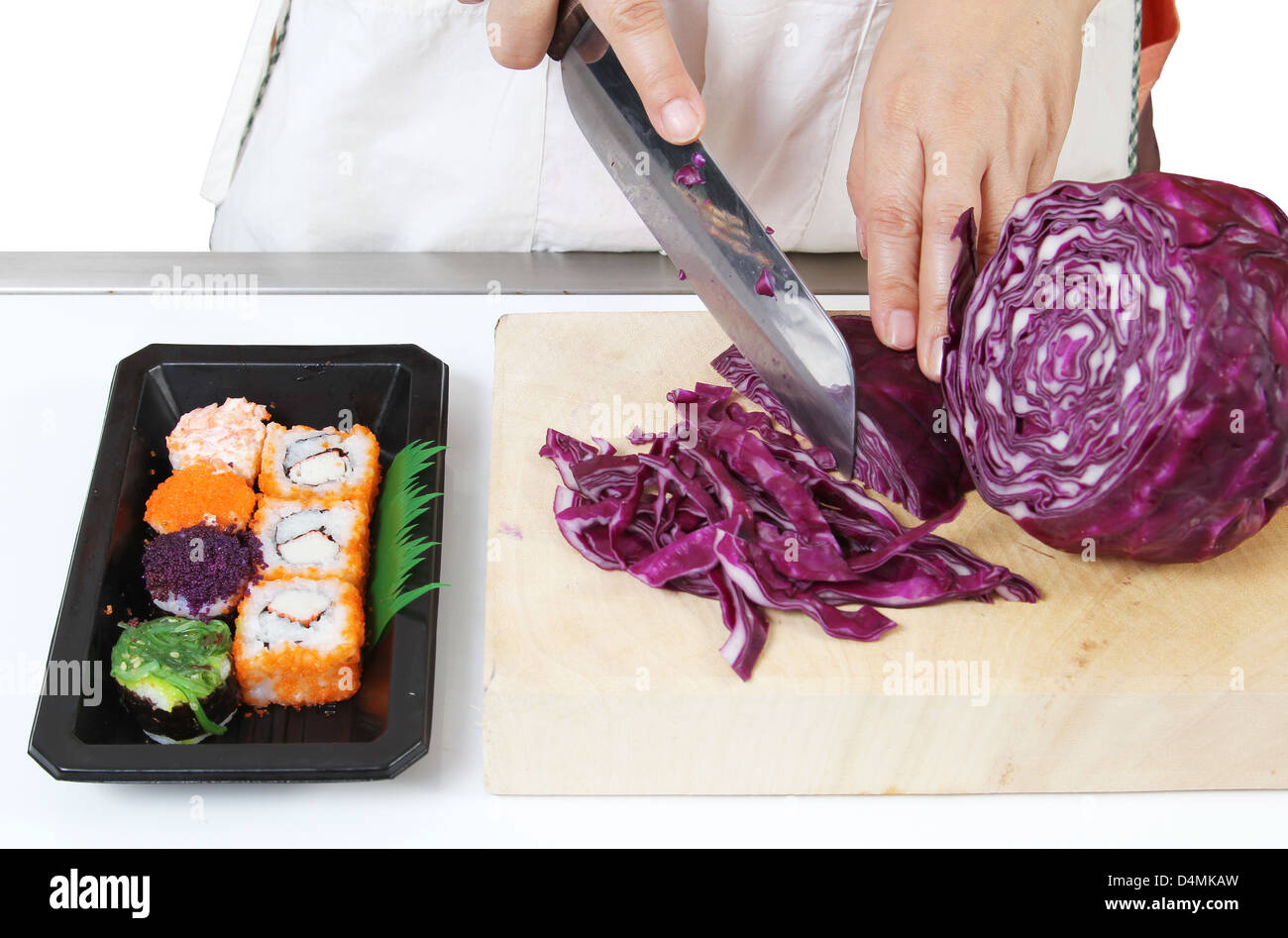 Closeup image of hand cutting vegetables for sushi japanese food Stock ...